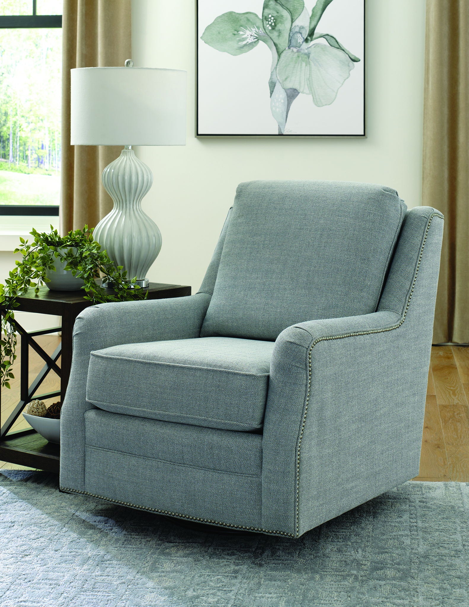 Emory - Swivel Glider With Nails – Eller & Owens Furniture and Mattress